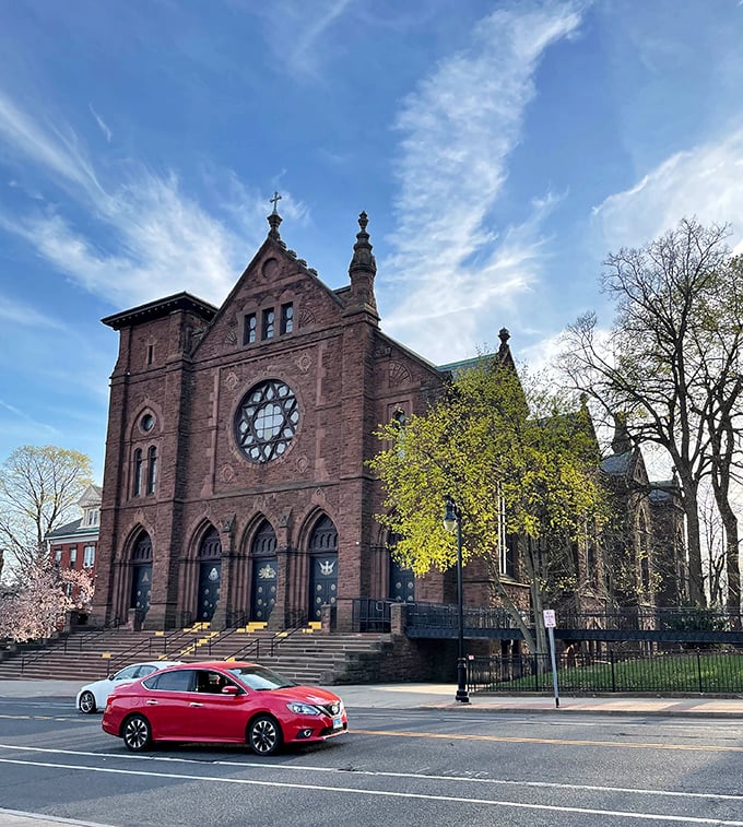 This historic church anchors the neighborhood, standing as solid proof that beautiful buildings don't require a trust fund.