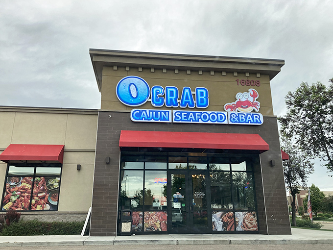 The cheerful O Crab storefront stands ready to transform your ordinary day into an extraordinary seafood celebration.