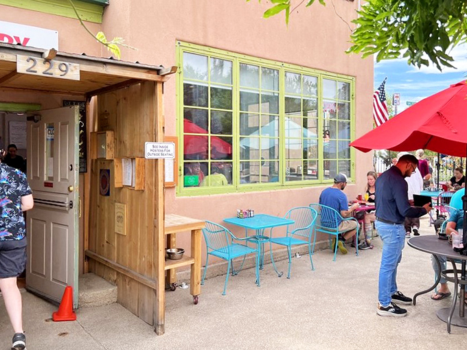 This vibrant patio setting invites you to slow down, savor the moment, and taste real local tradition. 