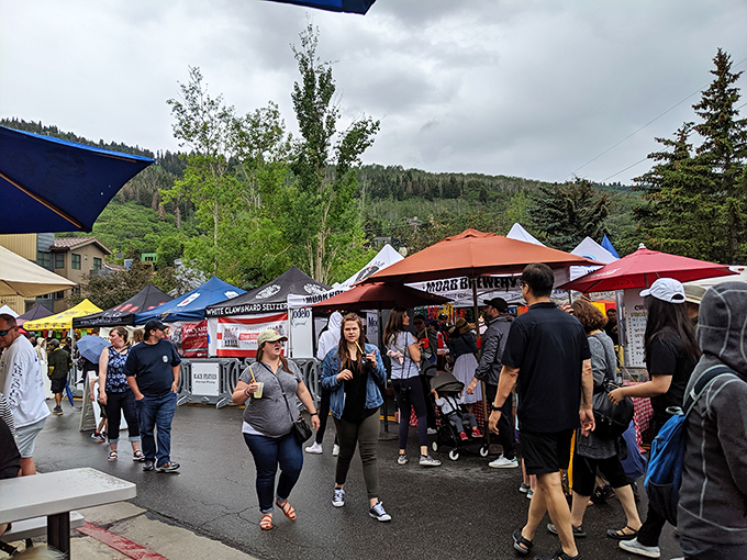 Main Street becomes a canvas of creativity where mountain town charm meets artistic expression beautifully.