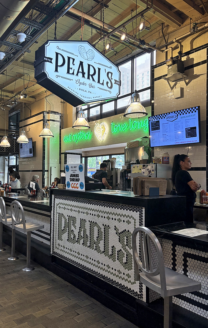 Black and white tiles frame a seafood symphony where every dish tells an oceanic story.