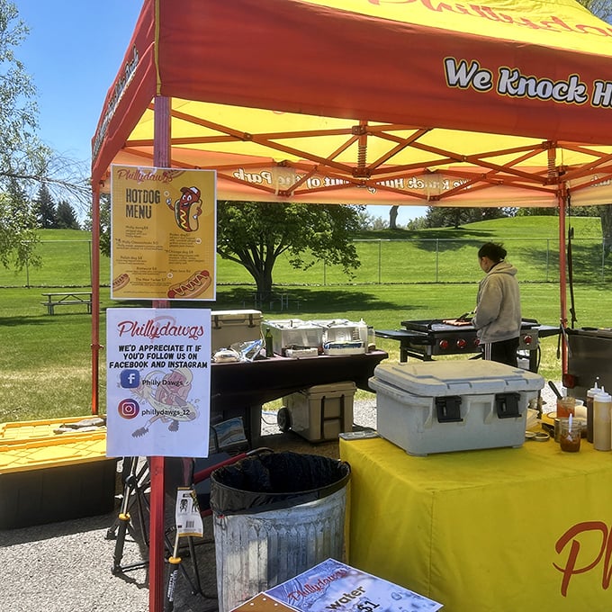 The mobile hot dog paradise that brings joy wherever it goes. That menu board is a roadmap to flavor country.