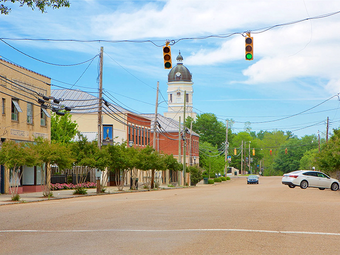 That courthouse clock tower rises like a lighthouse for land-locked travelers, guiding folks to the heart of a town that refused to change too much.