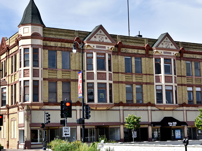 These storefronts have weathered decades while maintaining dignity, much like their affordable housing market.