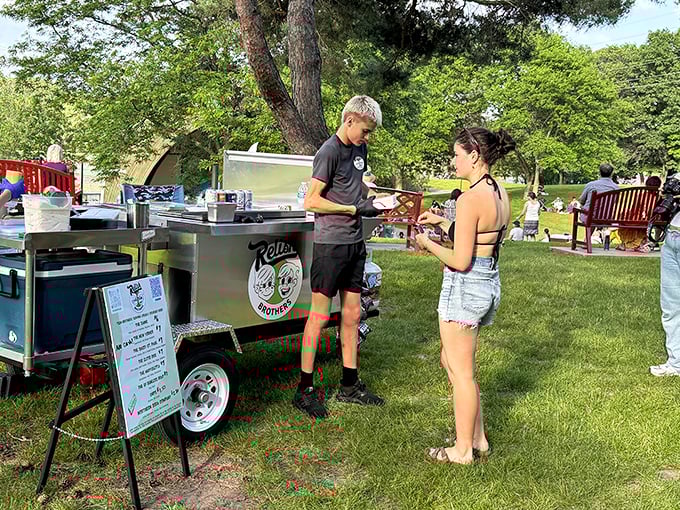 Hot dogs taste better outdoors! Relish Brothers' lakeside service proves that nature is the perfect seasoning for a classic dog.