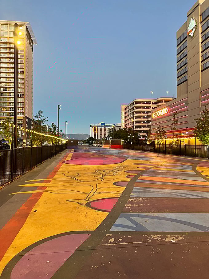 Reno's vibrant riverfront plaza bursts with color and creativity. Even the sidewalks here tell stories through public art.