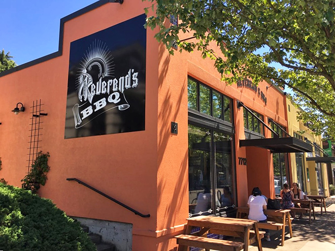 Sidewalk seating at Reverend's invites BBQ pilgrims to worship outdoors. The orange building houses some of Portland's most heavenly smoked meats.