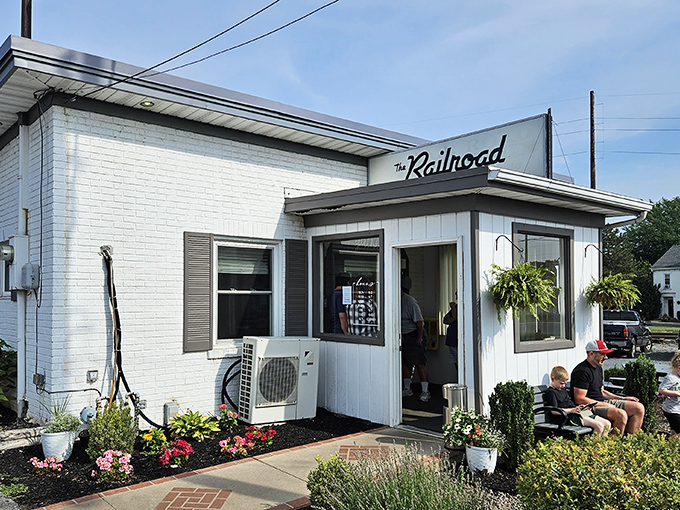 Simple white brick and welcoming flowers &ndash; this little trackside gem serves comfort food that would make any conductor stop the train.