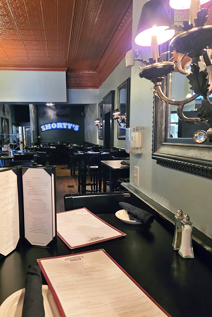 Inside Shorty's, the copper ceiling and blue glow create the perfect backdrop for serious meat appreciation.