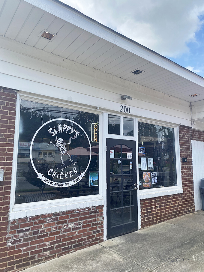 That simple white storefront hides Winston-Salem's worst-kept secret: fried chicken that makes you want to high-five strangers.