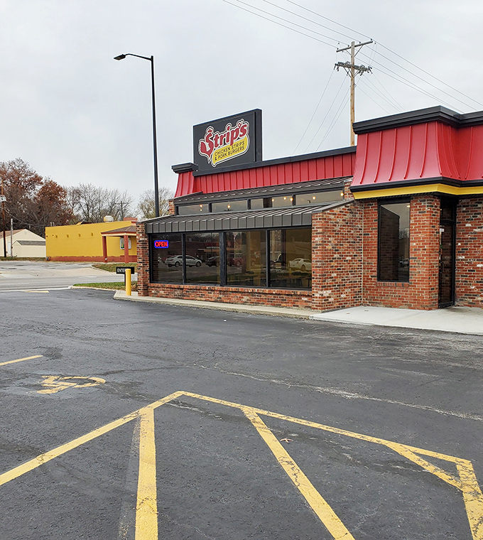 The classic brick-and-red aesthetic of Strip's feels like comfort before you even taste their perfectly golden fried chicken.