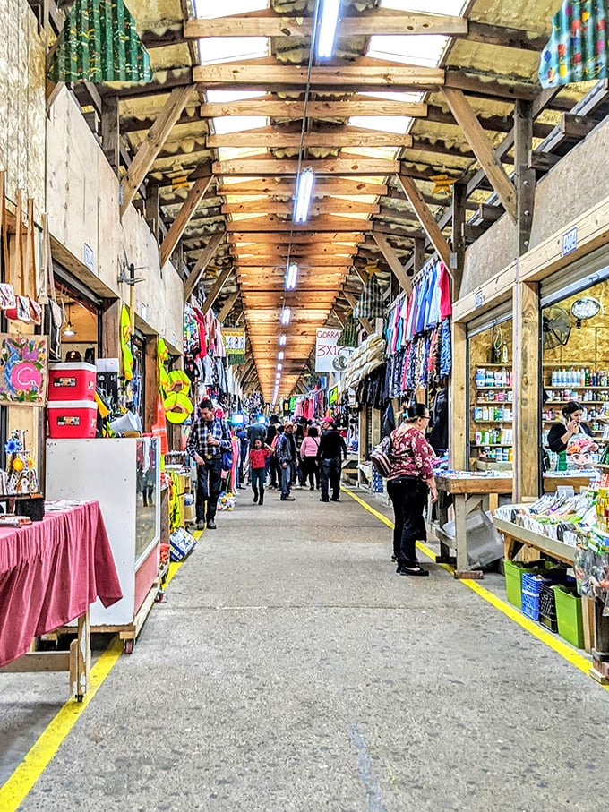 Wooden beams frame the walkway through this rustic market hall. The perfect setting for a Sunday afternoon treasure hunt!