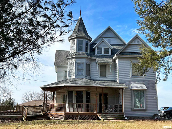 Turrets and wraparound porches! This Victorian charmer in Table Grove looks like it's waiting for a rocking chair and glass of lemonade.