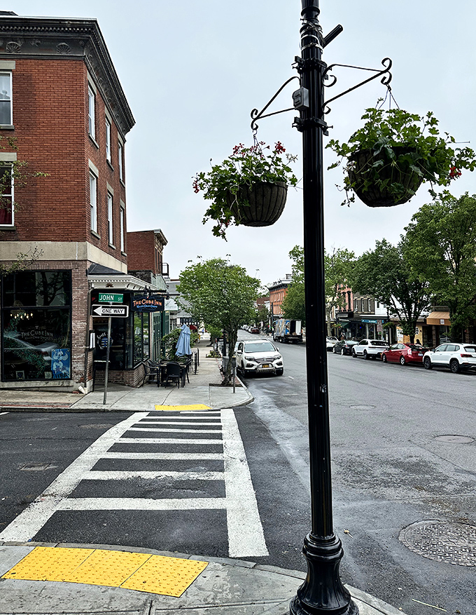 Classic red brick buildings line Tarrytown's streets, creating that perfect blend of history and modern convenience.