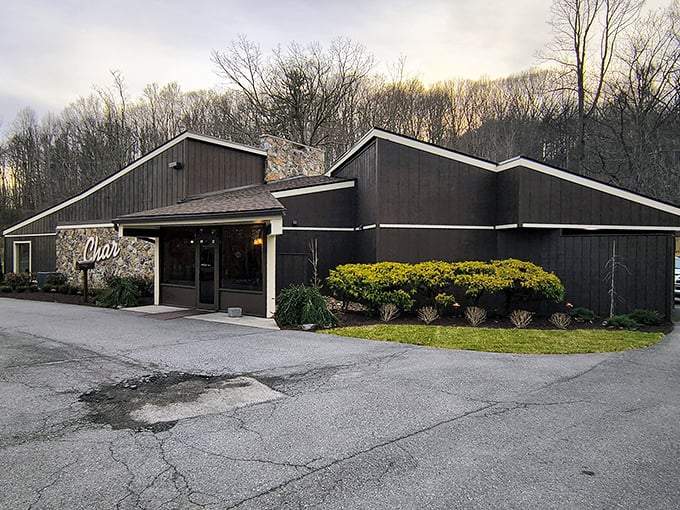 Nestled among the trees, The Char looks like a steakhouse that nature built. Simple outside, spectacular inside&mdash;just like the perfect steak.
