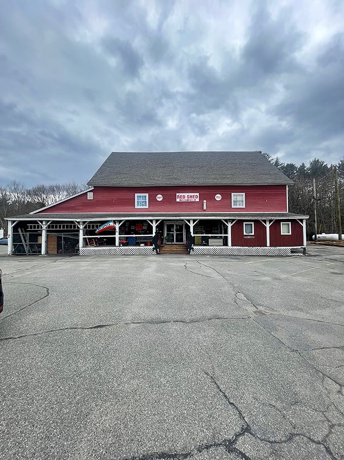 A quintessential New England scene: the big red barn thrift store against moody skies. Country charm meets bargain hunting at its finest.