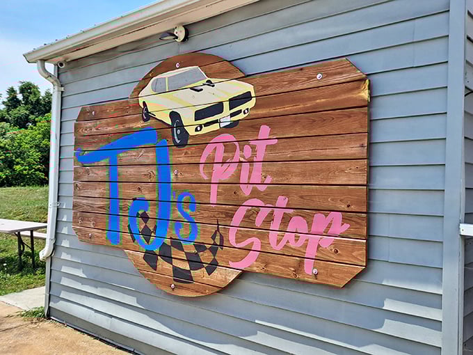 That wooden sign might as well say "Comfort Food Finish Line" – TJ's delivers home-cooking gold medals daily.