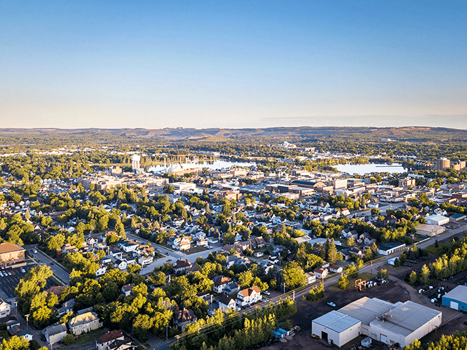 An aerial view of Virginia reveals a town nestled among northern Minnesota's legendary lakes. Nature's playground in every direction.