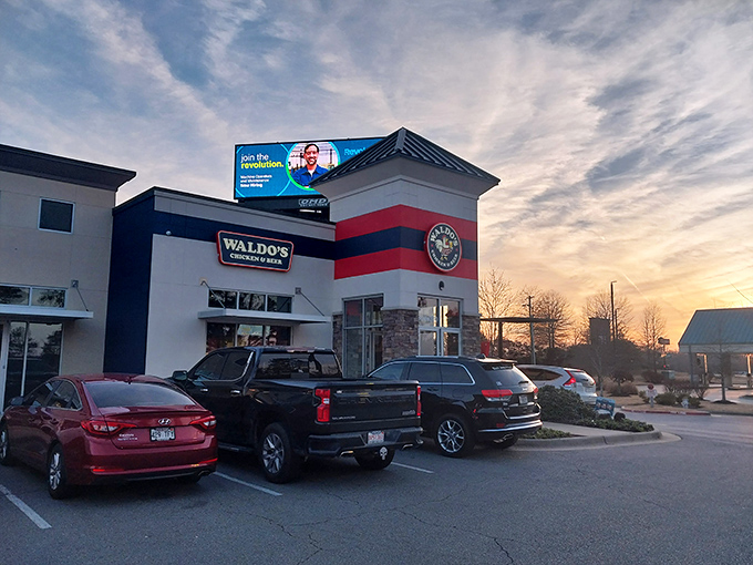 The sunset casts a golden glow on Waldo's &ndash; much like the perfect golden crust on their legendary chicken.