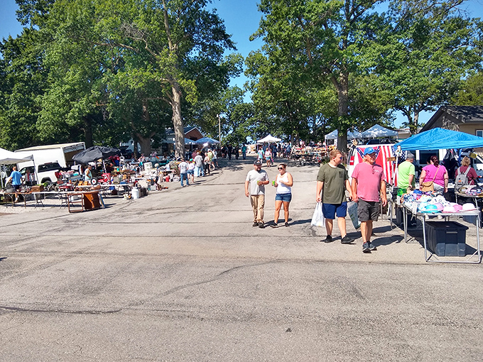 Community spirit fills the air as neighbors gather to share their treasures under Missouri skies.