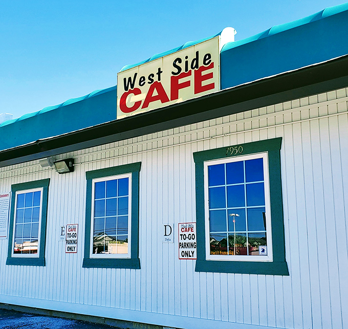 Those teal-trimmed windows frame a diner experience that's remained deliciously unchanged while the world outside keeps spinning.