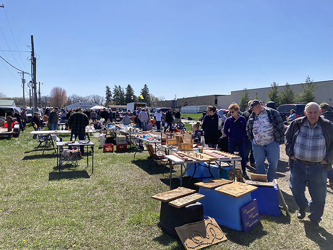 Rows of tables reveal their secrets to eager shoppers hunting for that perfect find.