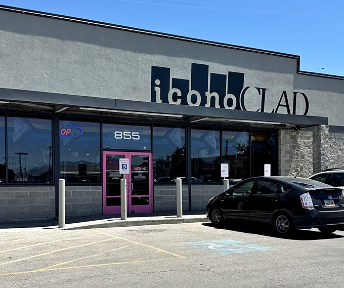 That pink door at iconoCLAD isn't just an entrance – it's a portal to a world where fashion gets its second act.