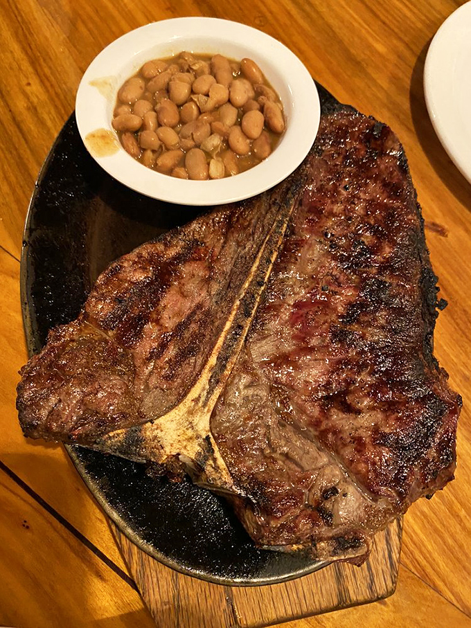 This porterhouse isn't just a steak, it's a commitment &ndash; a glorious slab of beef with a side of beans that knows its supporting role.