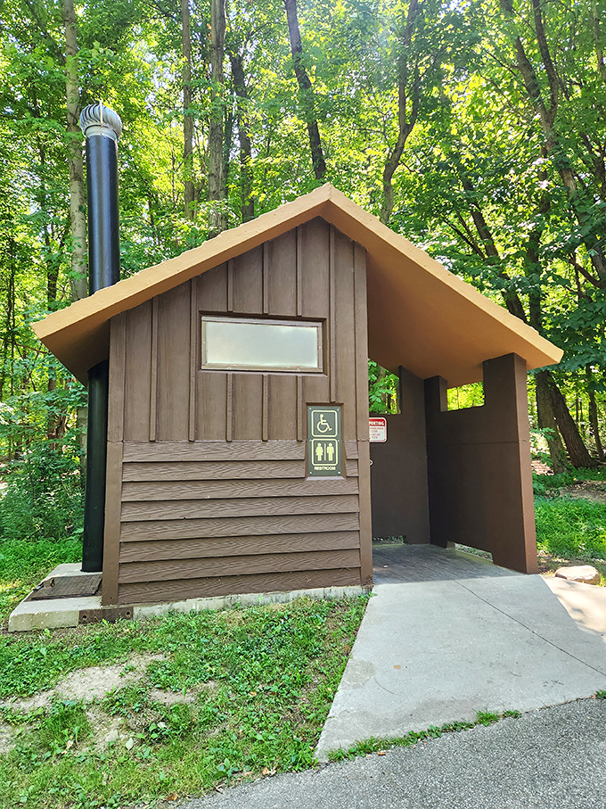 Even nature calls for a comfort break. This rustic restroom proves wilderness adventures don't require sacrificing all modern conveniences.