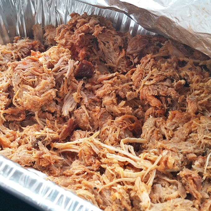 This tray of pulled pork is Arkansas poetry &ndash; each strand telling a story of smoke, time, and tradition that began long before Instagram food pics existed.