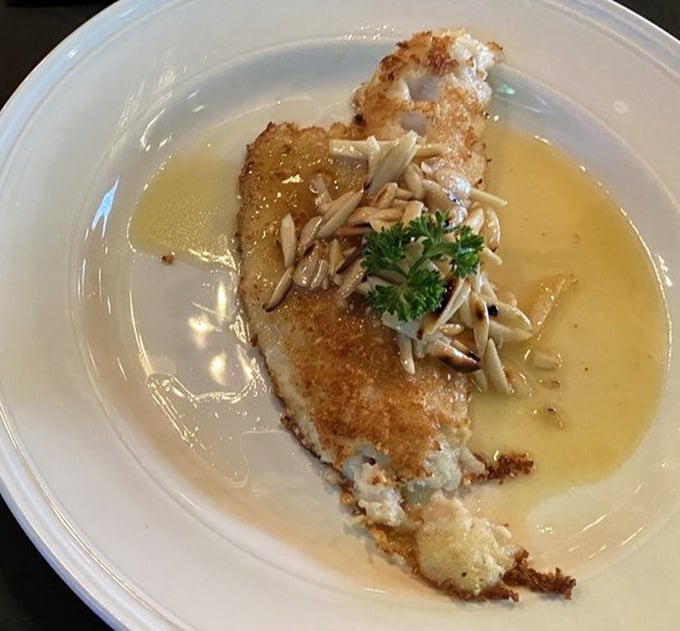 Almond-crusted walleye swimming in butter sauce&mdash;proof that Wisconsin knows fish better than coastal elites would ever admit.