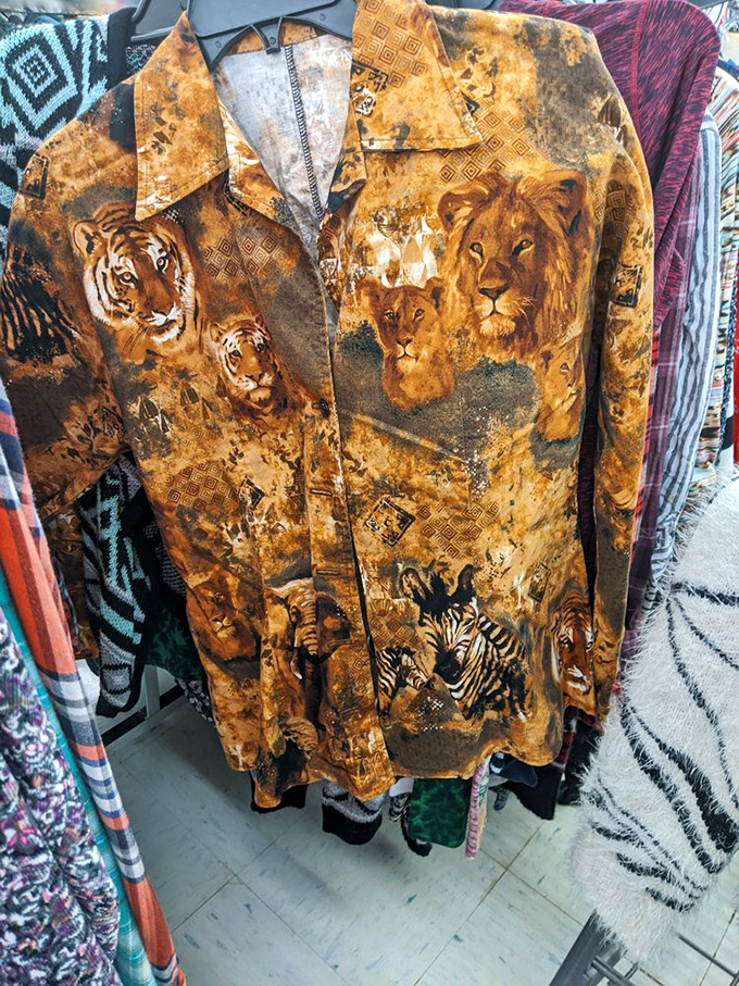 The safari-themed button-up screams "retired zoologist" or "that uncle who tells wild stories at Thanksgiving." Either way, it's magnificent.