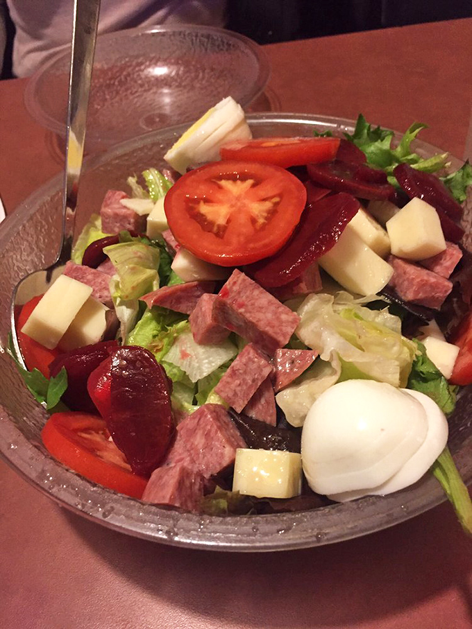 This antipasto salad isn't just a prelude&mdash;it's a symphony of Italian deli classics. Fresh mozzarella, salami, and that perfectly ripe tomato create the ideal pizza companion.