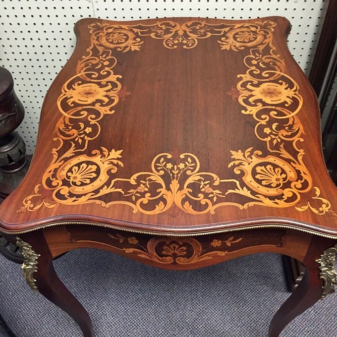 This isn't just a table&mdash;it's functional artwork with inlays so intricate they'd make today's furniture designers weep with inadequacy.