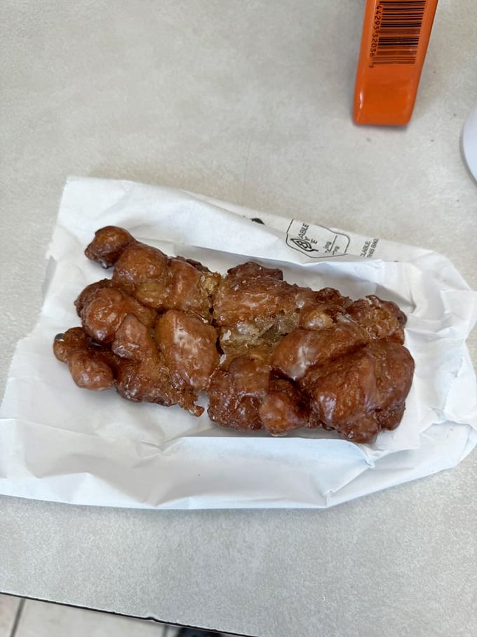 This apple fritter isn't just a donut&mdash;it's a commitment, a relationship, a delicious mountain of glazed apple-cinnamon goodness.