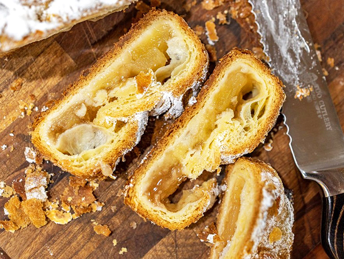 Layers upon layers of pastry revealing their golden secrets&mdash;like reading a delicious novel where every page turn brings another butter-laden plot twist.