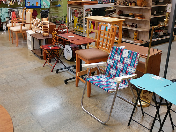 The furniture section: where mid-century meets mid-price. That woven lawn chair has stories to tell&mdash;probably about backyard barbecues and sunburns past.
