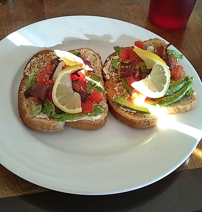 Avocado toast that doesn't require a second mortgage? This vibrant version with fresh tomatoes and lemon proves comfort food can occasionally wear a healthy disguise.
