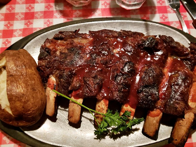 These BBQ beef ribs aren't just falling off the bone&mdash;they're practically jumping onto your fork, begging to be devoured alongside that picture-perfect baked potato.