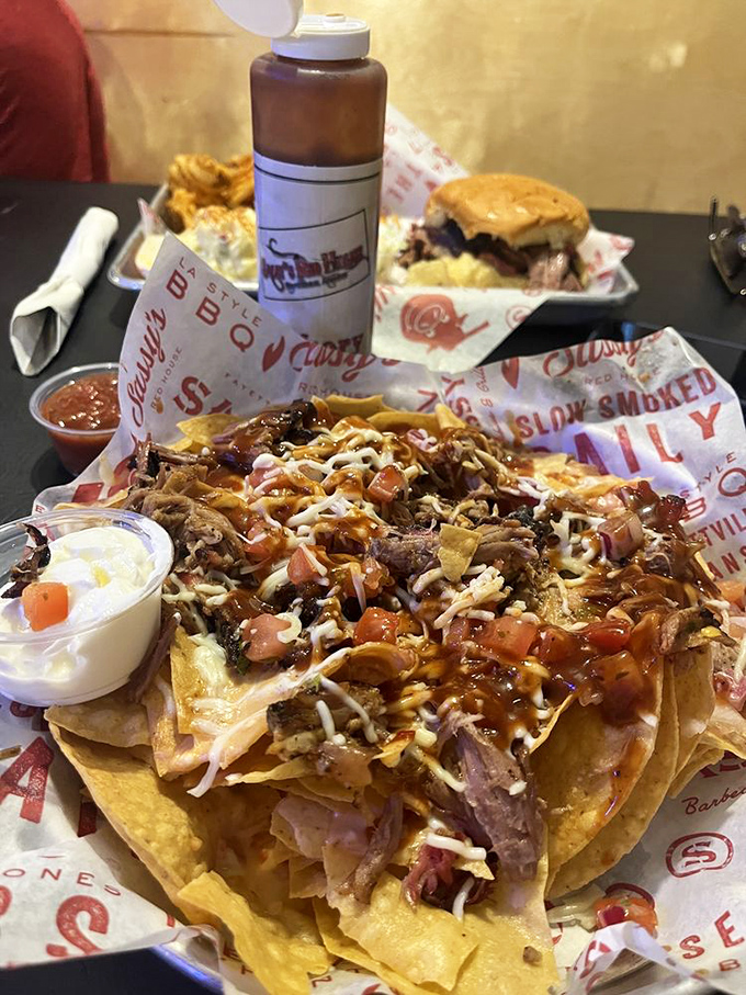 BBQ nachos that could make a Texan jealous—a mountain of chips buried under smoky meat, cheese, and toppings that requires both strategy and commitment.