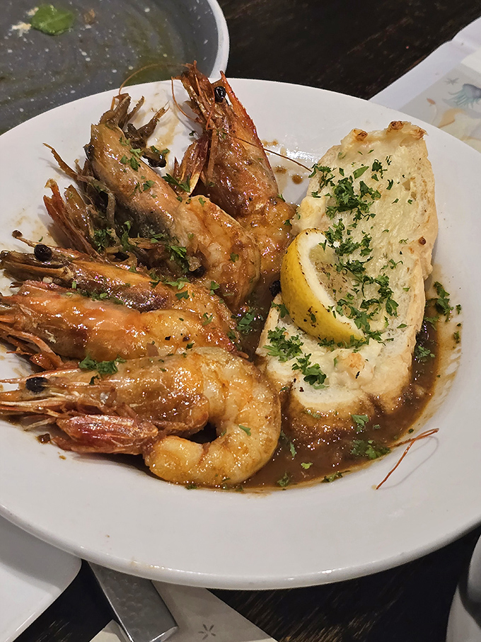 BBQ shrimp so good you'll contemplate drinking the sauce like a soup when nobody's looking. That bread isn't a side&mdash;it's a sauce-sopping necessity.