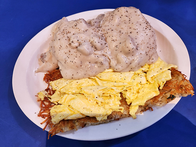 Biscuits and gravy that would make a Southern grandmother nod in approval, paired with eggs and hash browns that achieve golden perfection.