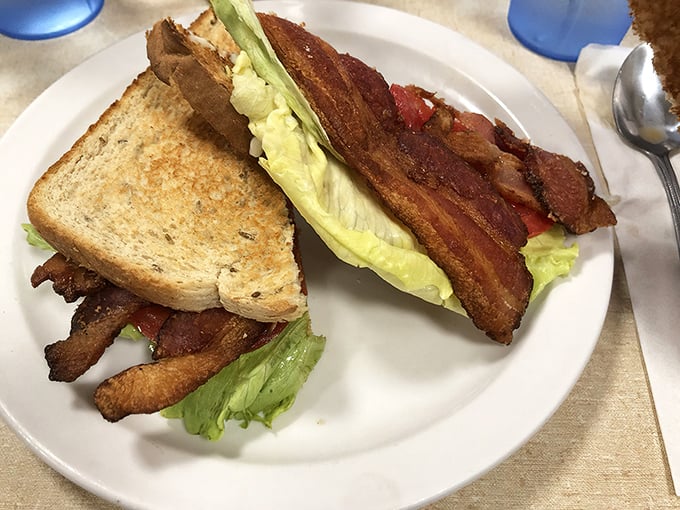 The BLT here isn't just a sandwich&mdash;it's architecture. Layers of crispy bacon, fresh lettuce, and tomato create the skyscraper of lunch dreams.