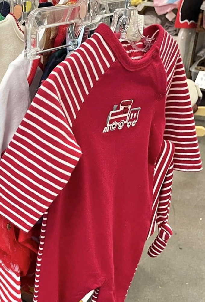 Tiny train enthusiasts rejoice! This adorable red and white striped outfit proves secondhand shopping isn't just economical&mdash;it's downright adorable.