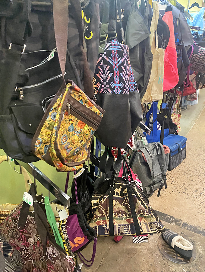 Handbag heaven for the savvy shopper. Designer knockoffs mingle with authentic vintage pieces in this colorful textile jungle.
