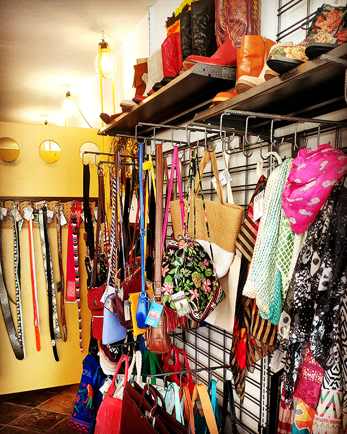 Accessory heaven awaits! This colorful corner proves that one person's forgotten handbag is another's newfound treasure.