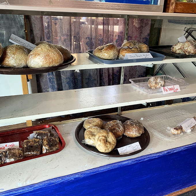 Fresh-baked treasures await behind glass, each promising to transport you to the old country. These golden-brown loaves aren't just bread&mdash;they're edible history.