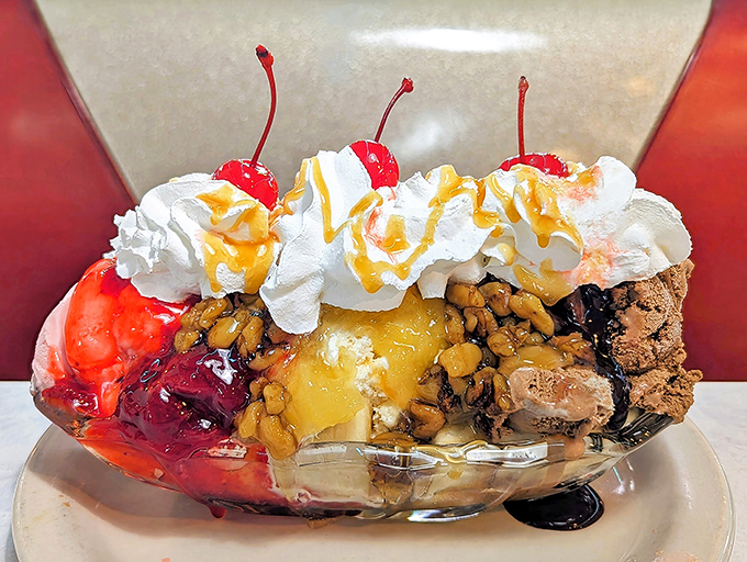 The banana split arrives like a dessert fever dream &ndash; ice cream mountains topped with whipped cream clouds and cherries standing sentinel over rivers of chocolate sauce.