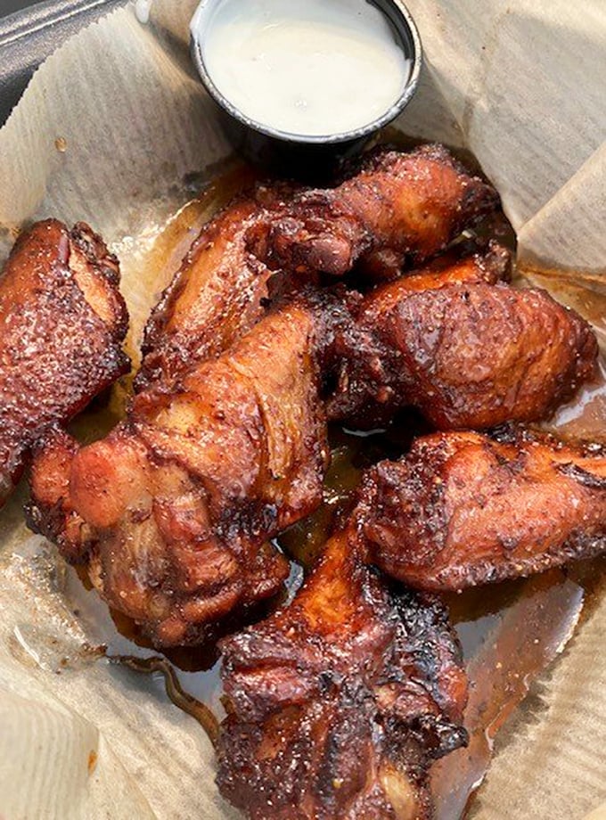 Who knew a seafood joint could smoke wings this good? These glistening beauties prove Charm City isn't just a one-trick pony in the culinary department.