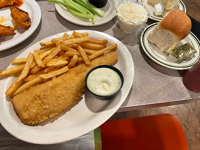 Fish so perfectly golden it belongs in Fort Knox. Paired with fries that achieve the mythical balance between crispy exterior and fluffy interior.